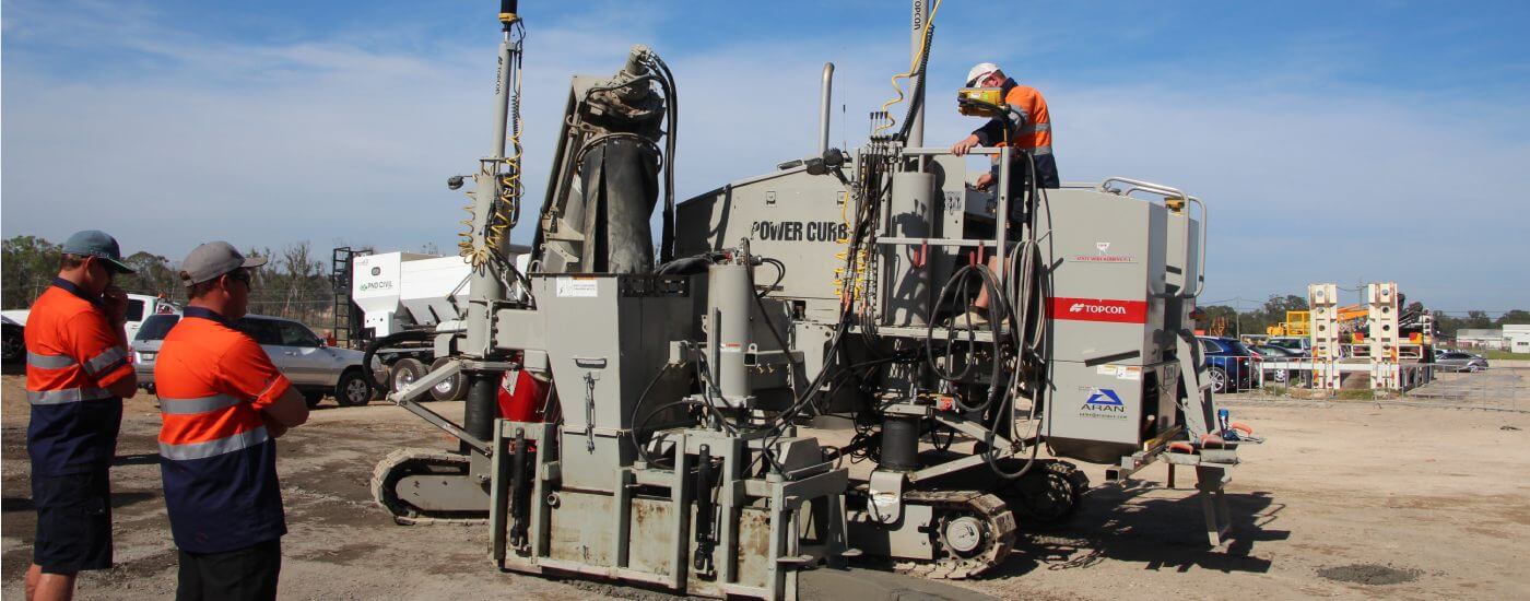 Stringless slipform paving with millimetre precision | Aptella